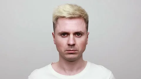 Young belarus guy staring at camera. Man... | Stock Video | Pond5