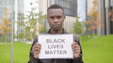 A young black man shows a Black Lives Ma... | Stock Video | Pond5