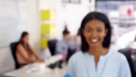 Young black woman in office walks into f... | Stock Video | Pond5