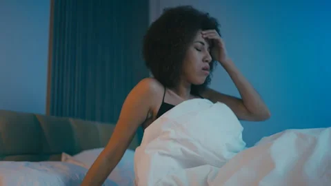Young black woman waking up from a night... | Stock Video | Pond5