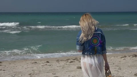 young blonde woman in a translucent whit... | Stock Video | Pond5