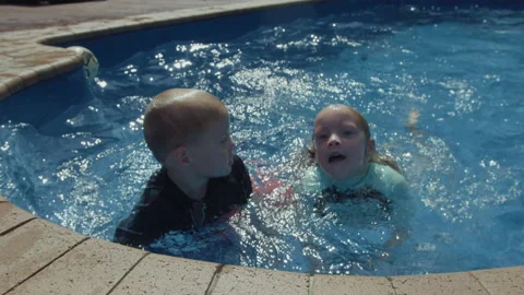 Boy Girl Swimming Pool Stock Videos – Royalty-Free HD & 4K Videos