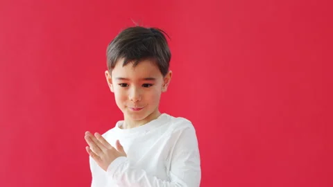 Young Boy Doing Robot Dance Against Red ... | Stock Video | Pond5
