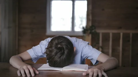 Young Boy Exhausted and Fast Asleep at t... | Stock Video | Pond5