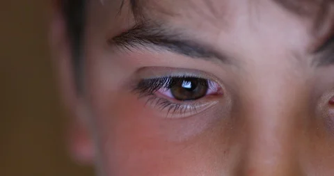 Young boy eyes staring at screen at nigh... | Stock Video | Pond5