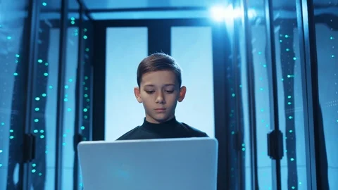 Young boy prodigy programming on laptop ... | Stock Video | Pond5