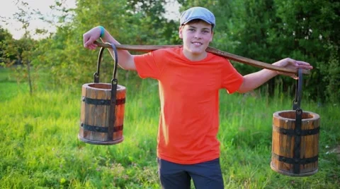 Young boy rotates with shoulder-yoke on ... | Stock Video | Pond5