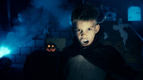 Young boy in a vampire costume for Hallo... | Stock Video | Pond5