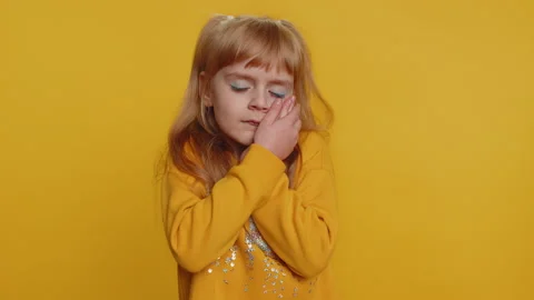 Young child girl kid touching cheek terr... | Stock Video | Pond5