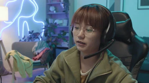 Young Chinese Female Gamer Scoring in Vi... | Stock Video | Pond5