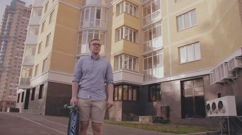 young cool guy standing with his longboa... | Stock Video | Pond5