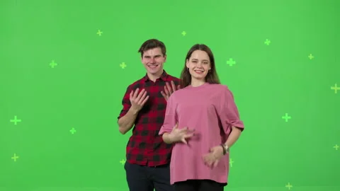 young couple is dancing on a green scree... | Stock Video | Pond5