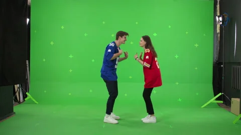 young couple is dancing on a green scree... | Stock Video | Pond5