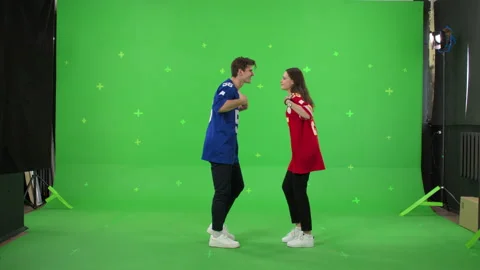 young couple is dancing on a green scree... | Stock Video | Pond5