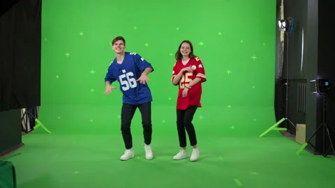 young couple is dancing on a green scree... | Stock Video | Pond5