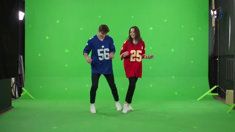 young couple is dancing on a green scree... | Stock Video | Pond5
