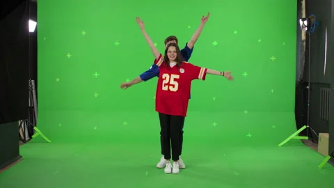 young couple is dancing on a green scree... | Stock Video | Pond5