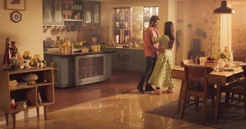 Young couple Dancing in Kitchen | Stock Video | Pond5