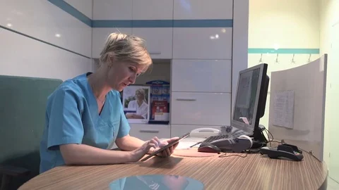 Young dentist explains procedure on x-ra... | Stock Video | Pond5