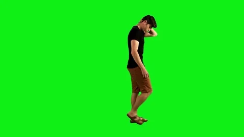 A young depressed man walking over green... | Stock Video | Pond5