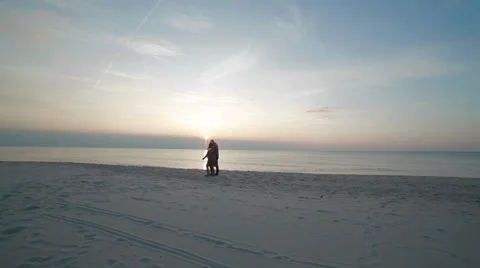 Young enamored couple walking slowly ste... | Stock Video | Pond5