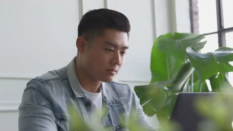 Young Entrepreneur Typing on Computer We... | Stock Video | Pond5