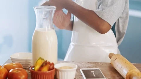 Young family cooking food in kitchen. Ha... | Stock Video | Pond5