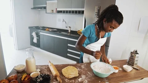 Young family cooking food in kitchen. Ha... | Stock Video | Pond5