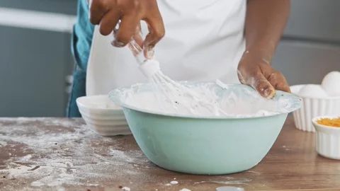 Young family cooking food in kitchen. Ha... | Stock Video | Pond5
