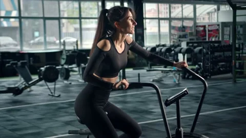 Young female athlete trains cardio on a ... | Stock Video | Pond5