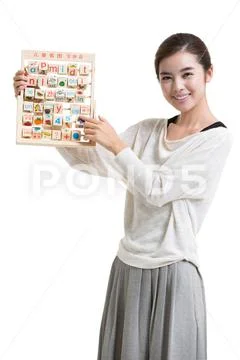 Young female Chinese teacher teaching phonetic alphabet Beijing China ...