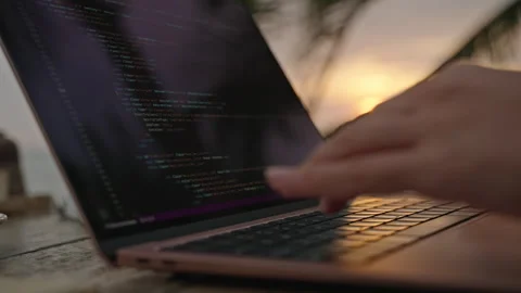 Young female developer working on laptop... | Stock Video | Pond5