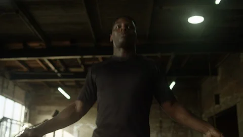 Young, fit African American man skips ro... | Stock Video | Pond5