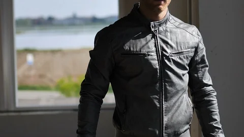 Young fit man opening jacket on naked mu... | Stock Video | Pond5