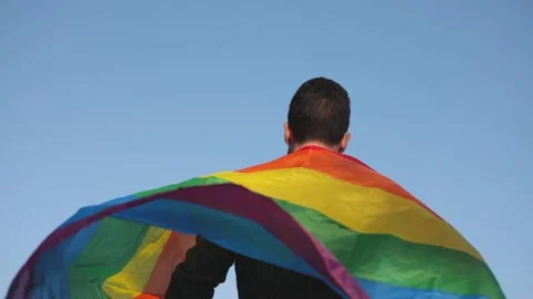 Young gay man smiling in the LGBT gay pr... | Stock Video | Pond5