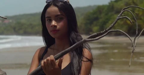 Young girl at the beach facial close up ... | Stock Video | Pond5