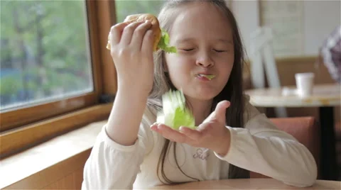 Messily Eating Burger Stock Videos – Royalty-Free HD & 4K Videos