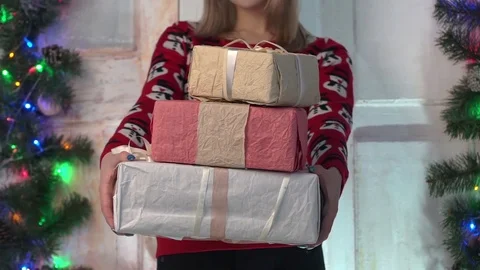 Young Girl Gives A Gift. Gift Box. Congr... | Stock Video | Pond5