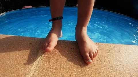 Young girl jumping backwards into a summ... | Stock Video | Pond5