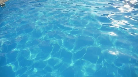 Young girl jumping feet first in a swimm... | Stock Video | Pond5