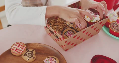 Young girl making sweets in the kitchen | Stock Video | Pond5