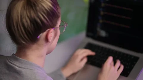 A young girl programmer sits in front of... | Stock Video | Pond5