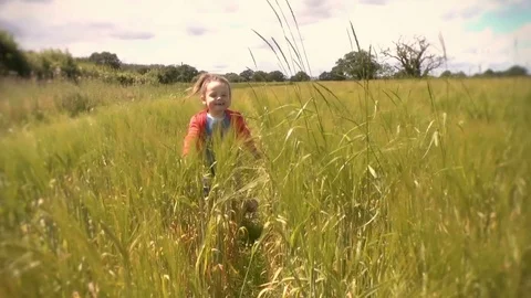 Girl Running Through Field Stock Video Footage | Royalty Free Girl ...