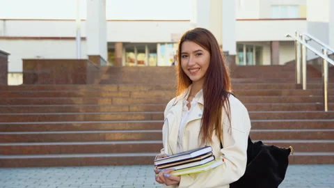 Young girl student smiling near universi... | Stock Video | Pond5