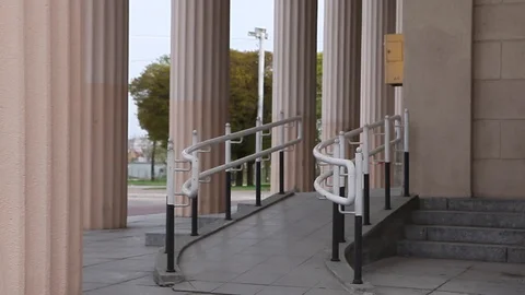 Young girl walking up ramp with pillars ... | Stock Video | Pond5