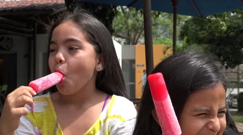 Girls Eating Popsickels Stock Videos – Royalty-Free HD & 4K Videos