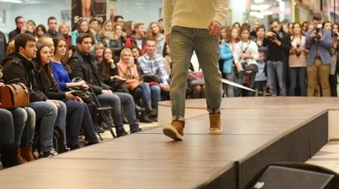 Young guy model walking on catwalk on th... | Stock Video | Pond5