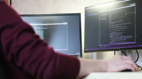 young guy programmer typing on a keyboar... | Stock Video | Pond5