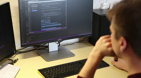 young guy programmer typing on a keyboar... | Stock Video | Pond5
