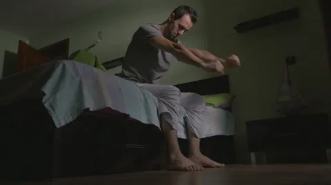 Man Getting Out Of Bed Stock Videos – Royalty-Free HD & 4K Videos